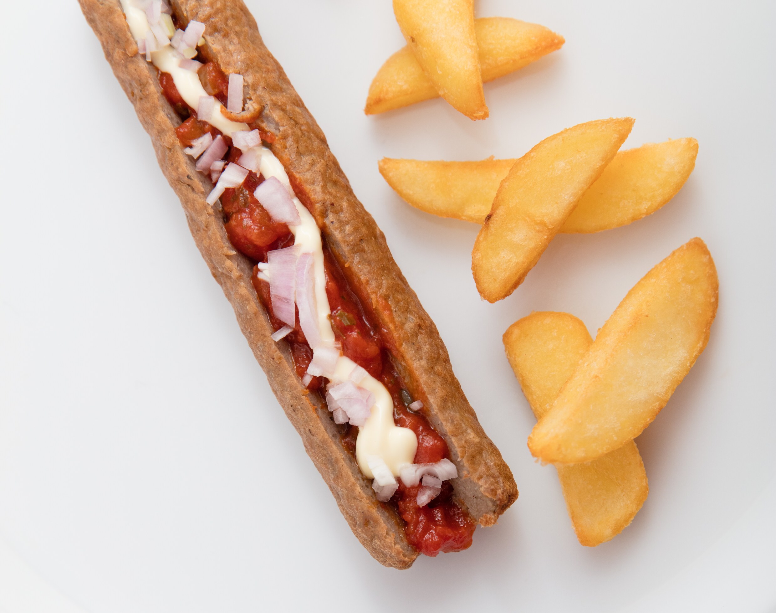 Waarom de frikandel de duurzaamste snack in de snackbar is | Libelle