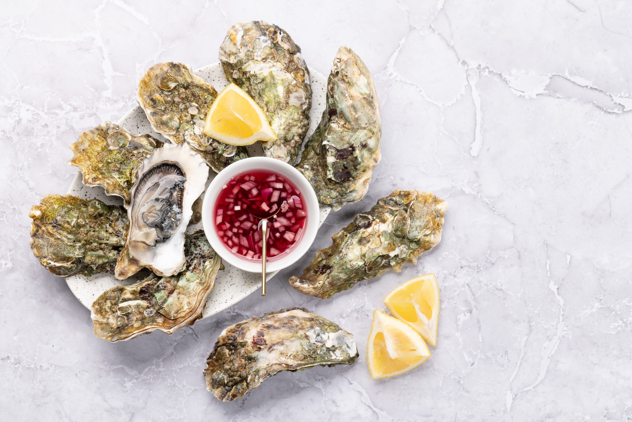 Voor de liefhebber: zó open en serveer je oesters